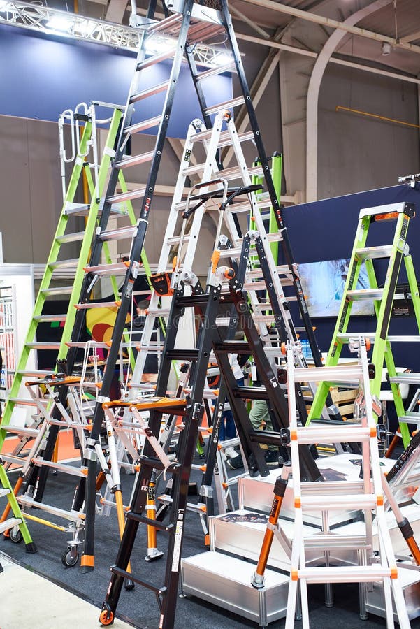 Folding ladders in store stock photo. Image of tool - 274393728