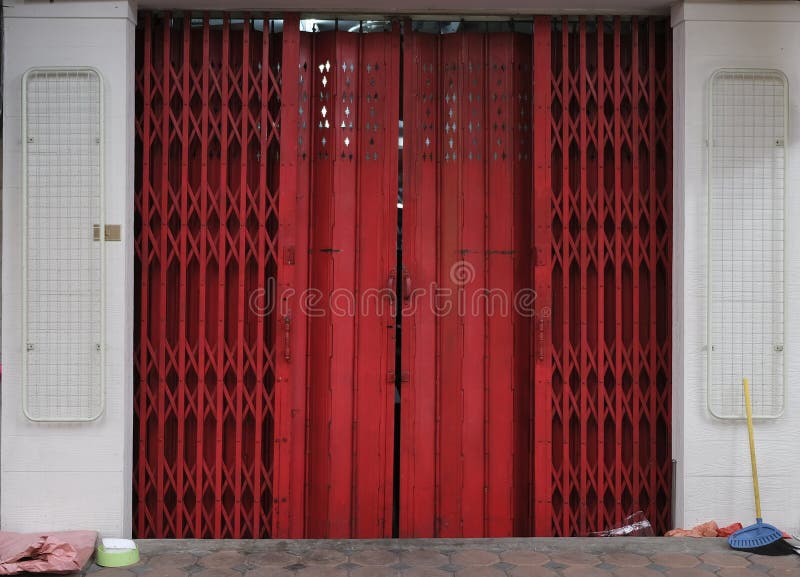 Folding Metallic Grill in Front of a Shop Stock Image - Image of exit ...