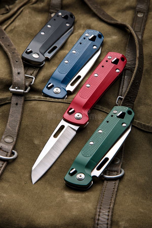 Folding Multitool Penknives on a Khaki Canvas Backpack. a Pocket-sized ...
