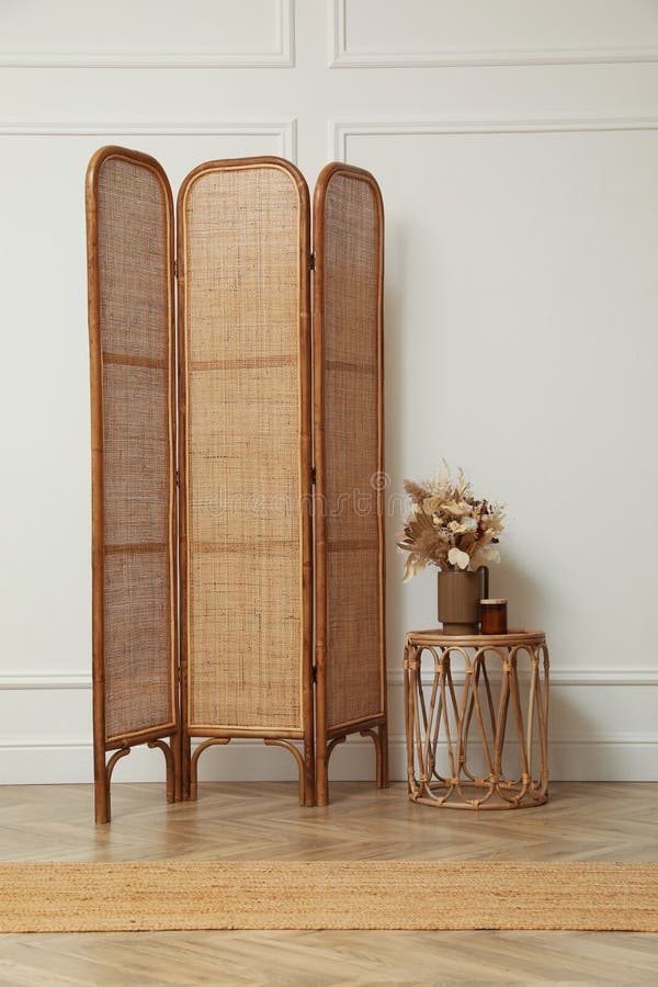 Folding Screen and Small Table with Flowers in Room. Interior Design ...
