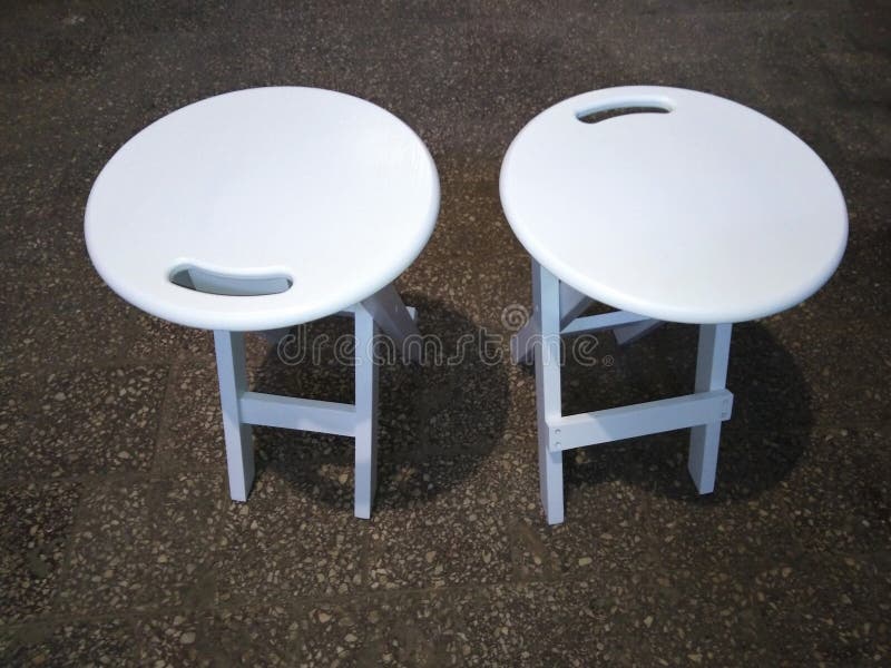 Two Wooden Stools with the Folding Legs of White Color Stock Image ...