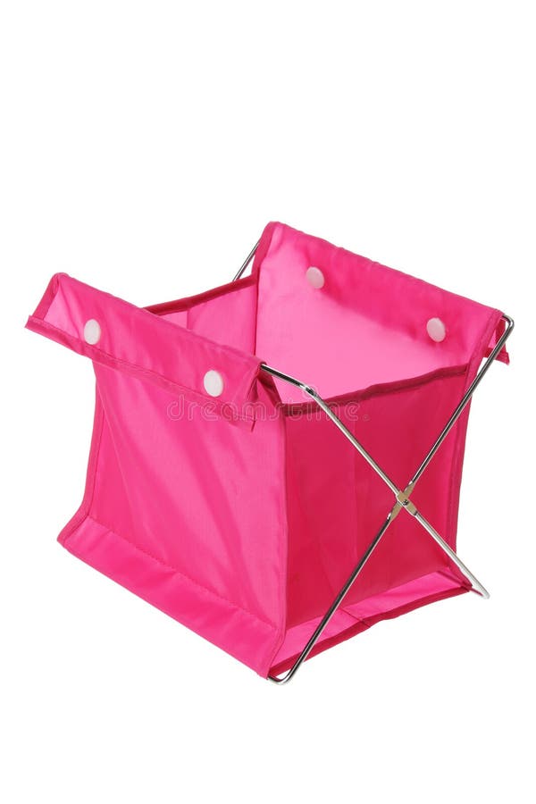 Storage Bin with Folding Lid Hanging on Diaper Changing Table. Stock ...