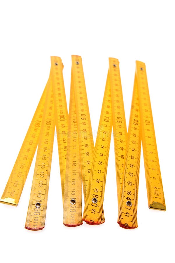 Folding Yellow Ruler stock photo. Image of inches, background - 6955706