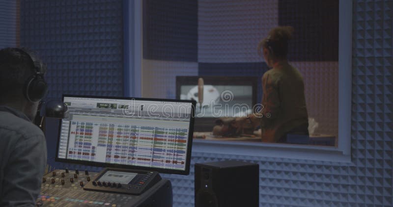 Foley Artist and Sound Engineer Working in Studio Stock Image - Image ...