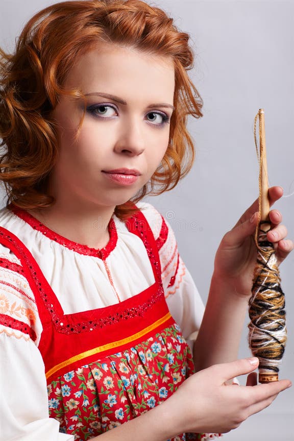 Folk girl with distaff stock image. Image of cute, distaff - 20950445