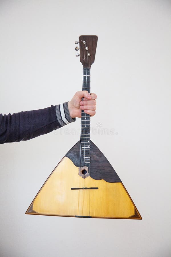Folk Musical Instrument Balalaika Stock Photo - Image of hand, antique ...
