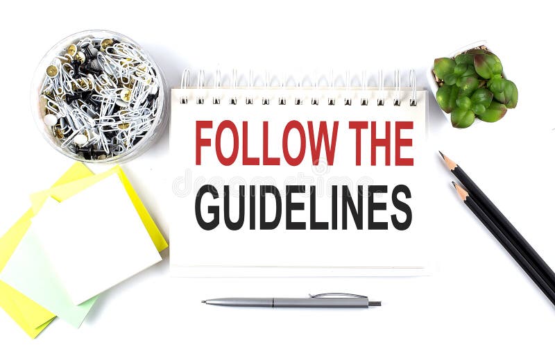 GUIDELINES Text on a Notebook with Chart and Calculator and Coins ...