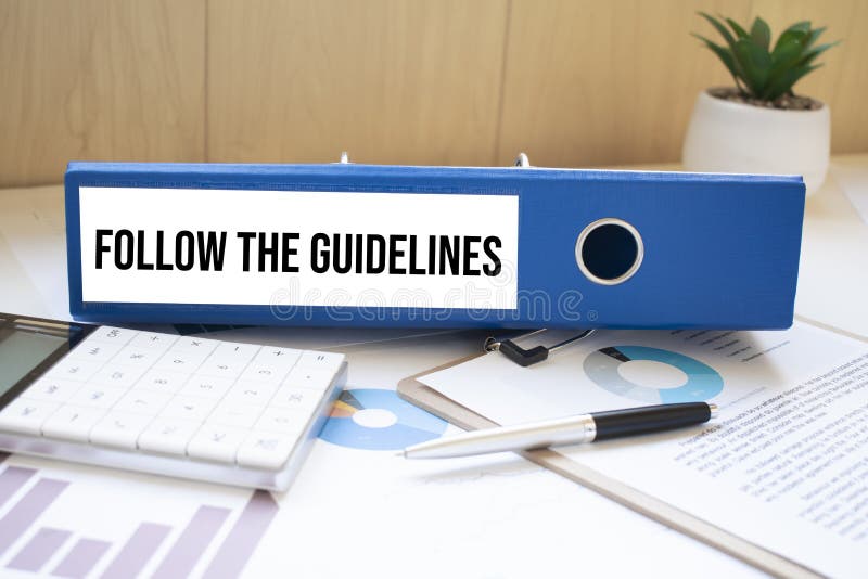 FOLLOW the GUIDELINES Words on Labels with Document Binders Stock Photo ...