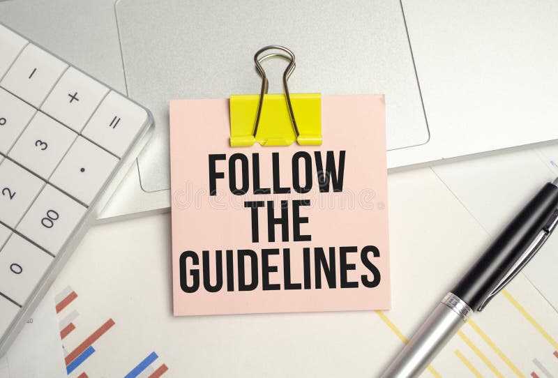 FOLLOW the GUIDELINES is Written in a White Notepad Stock Photo - Image ...
