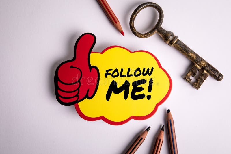 Follow Me. Sticker with Text on White Office Table Stock Photo - Image ...