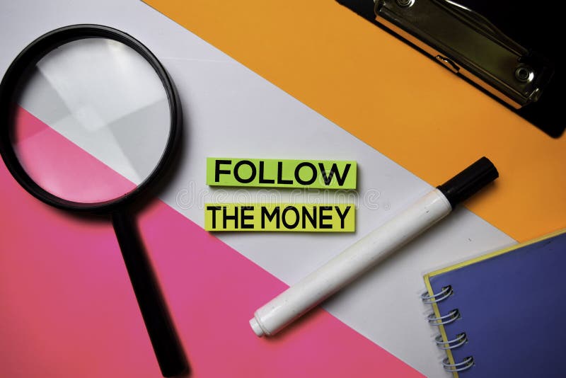 Follow the Money Text on Sticky Notes with Color Office Desk Concept ...