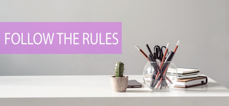 FOLLOW the RULES â€“ Text on the Background of the Office Table ...