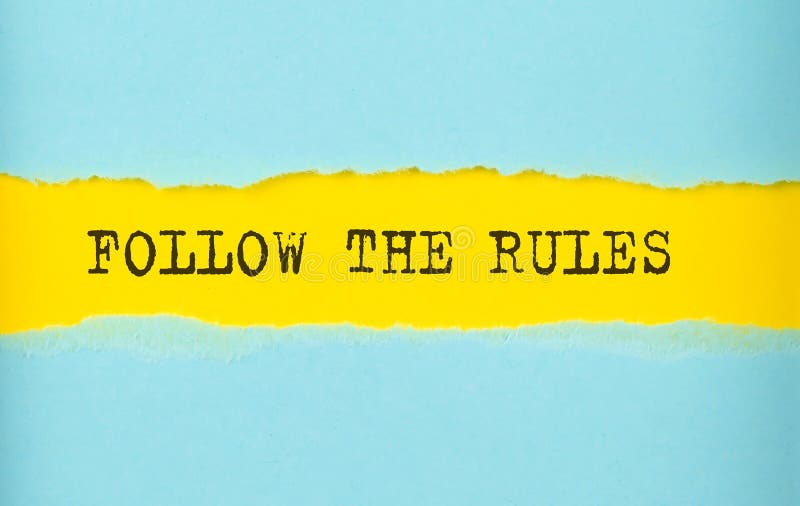 FOLLOW the RULES Text on the Torn Paper , Yellow Background Stock Photo ...