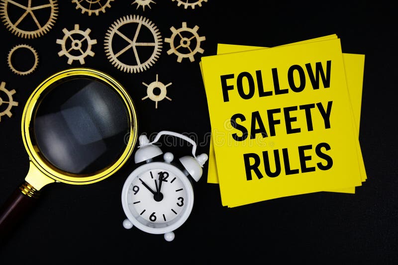 Follow Safety Rules Text Message on Sticky Note with Magnifying Glass ...