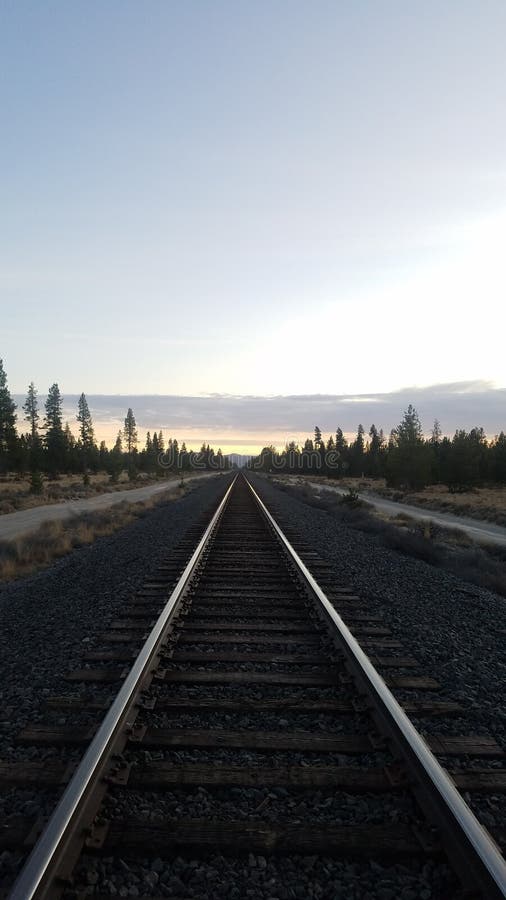 Follow the Train Tracks Off into the Sunset Stock Photo - Image of ...