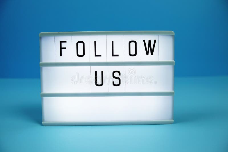 Follow Us Letterboard Text on LED Lightbox on Blue Background Stock ...