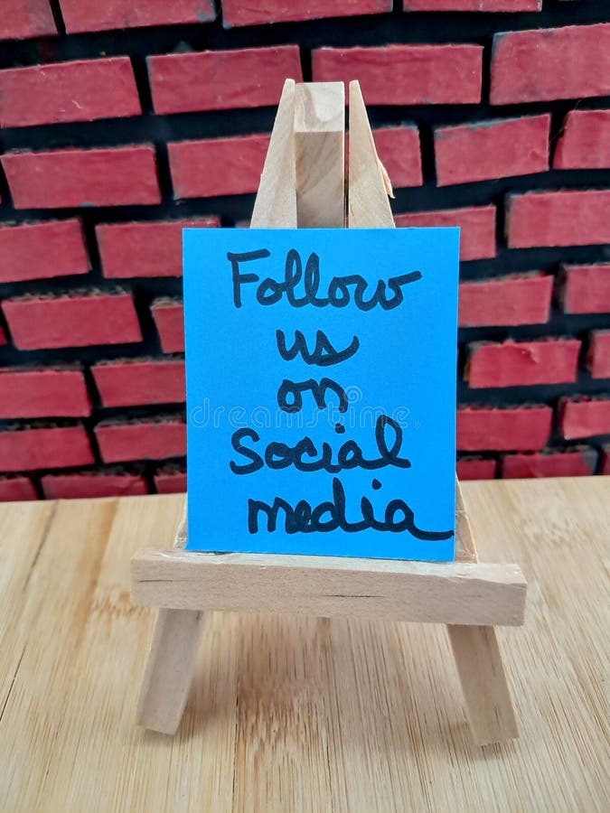 Follow Us on Social Media Message on Wood Easel Stock Image - Image of ...