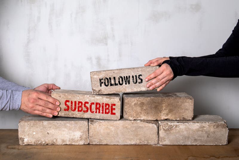 Follow Us and Subscribe Concept. White Brick Stack on a Wooden Table ...