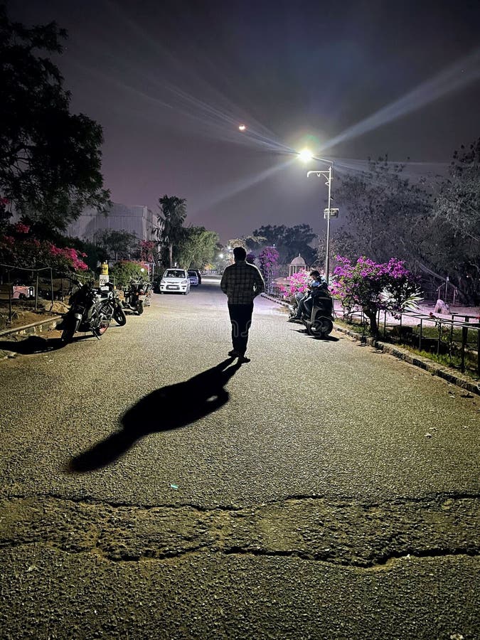 Followed by shadow person stock image. Image of night - 277654071