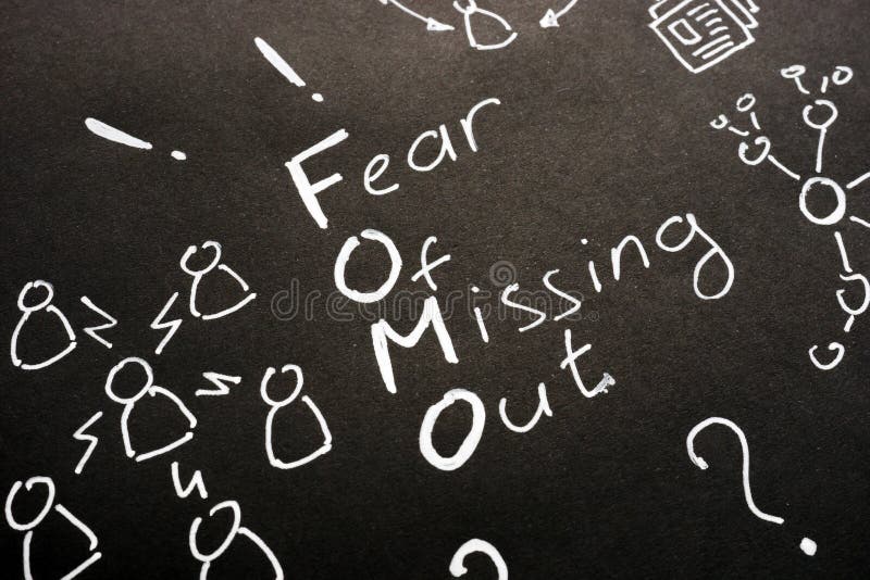 FOMO - Fear of Missing Out Sign on Black Sheet Stock Photo - Image of ...
