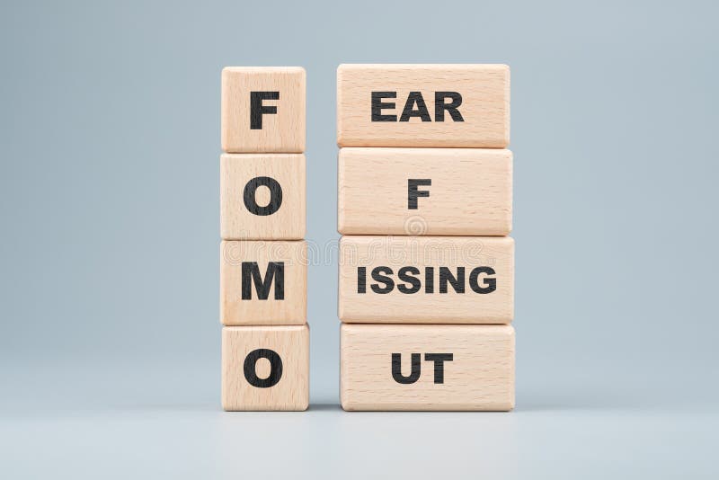 FOMO, or Fear of Missing Out Text on Wood Blocks Stock Image - Image of ...