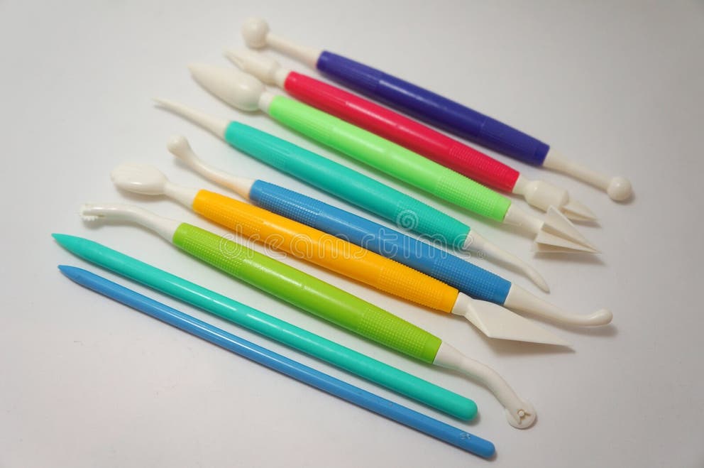 Fondant Decorating Instruments for Cake on White Background Stock Photo ...