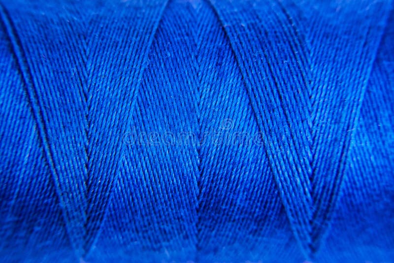Fondo Azul De Hilo De Coser Imagen de archivo - Imagen de costura ...