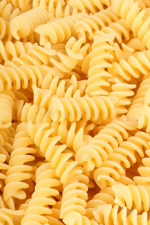 Fondo De Las Pastas De Fusilli Imagen de archivo - Imagen de color ...