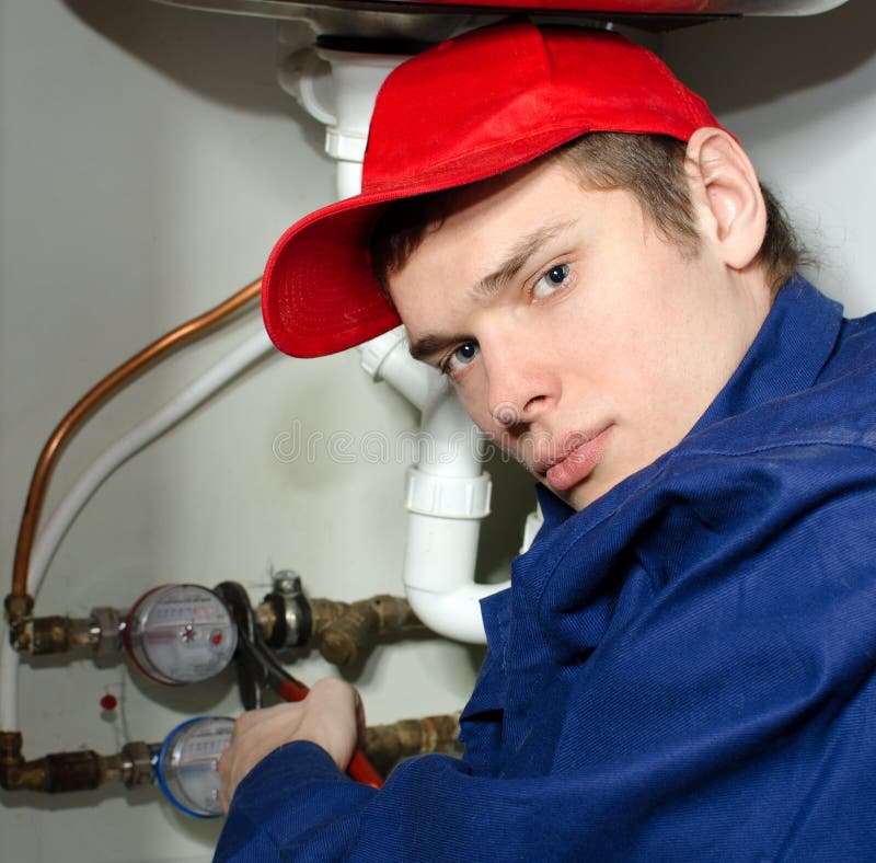 Fontanero en uniforme imagen de archivo. Imagen de persona - 29235113