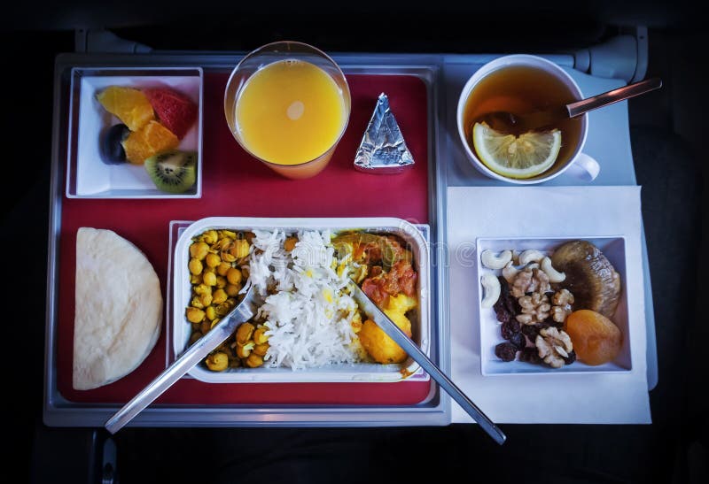 Lunch in Airplane. Inflight Economy Class Meal on Tray: Butter, Bread ...