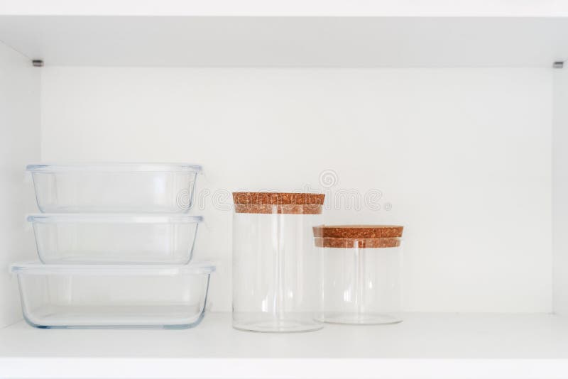 Food Containers and Glass Jars on White Shelf at Kitchen Stock Photo ...