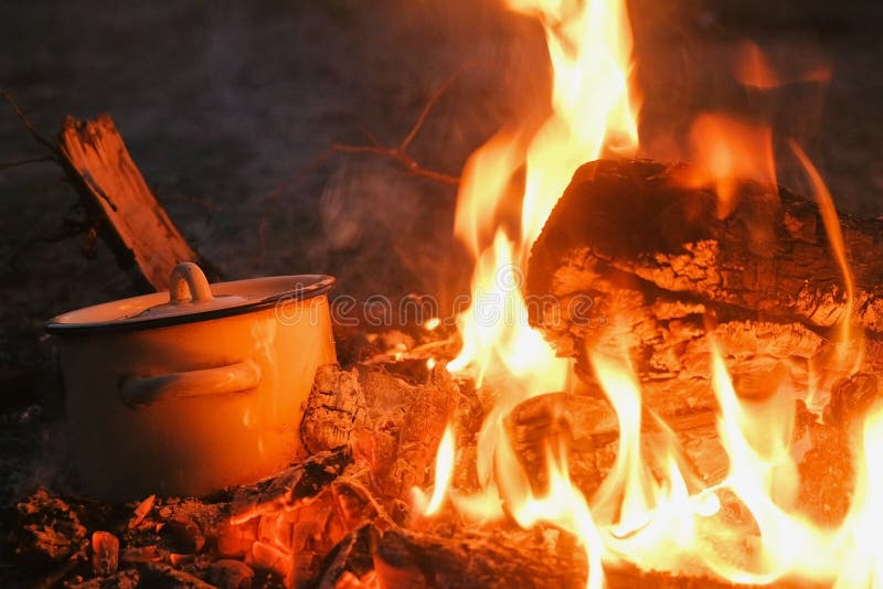 Food is Cooked on the Bonfire in a Pot. Stock Image - Image of orange ...