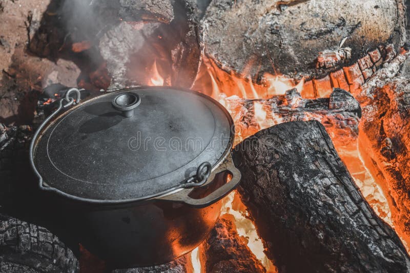 Food is Cooked in a Pot on a Fire Stock Photo - Image of picnic, steam ...