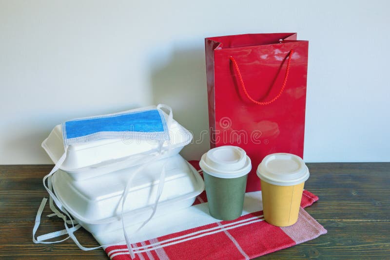 Food Delivery. Takeout Containers and Face Protective Mask on Dark ...