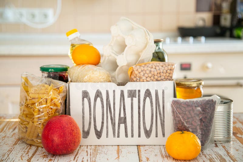 Food Donations in Box in Kitchen Background Stock Image - Image of ...