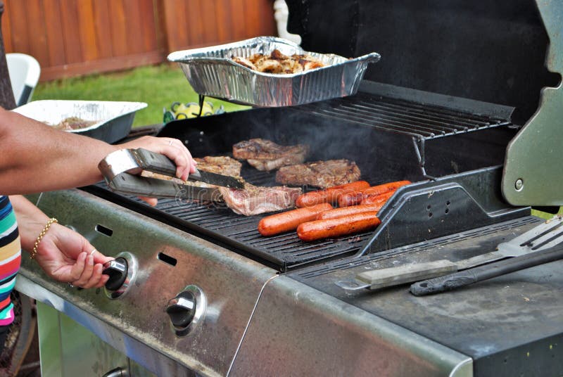 Food on the Grill at a Backyard Cookout Stock Image - Image of grills ...