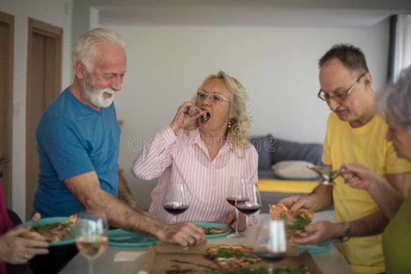 Food Has a Way of Making the Conversation Better Stock Photo - Image of ...