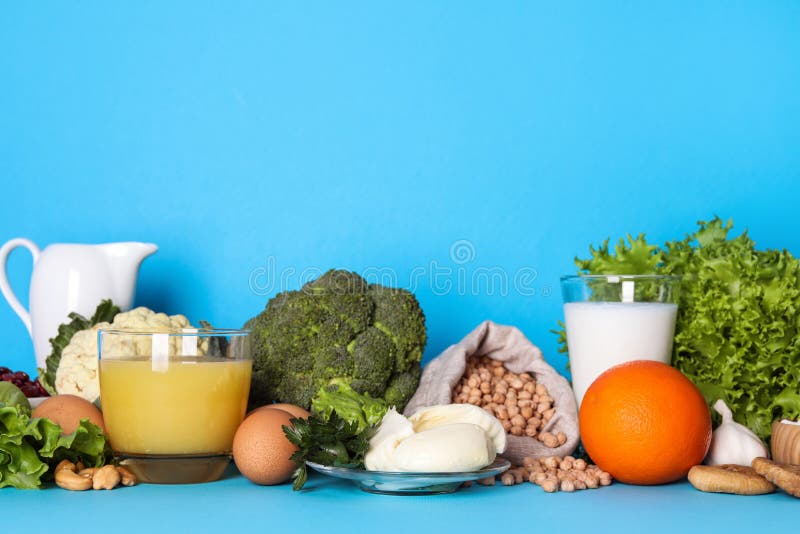 Food High in Calcium. Different Products on Light Blue Background Stock ...