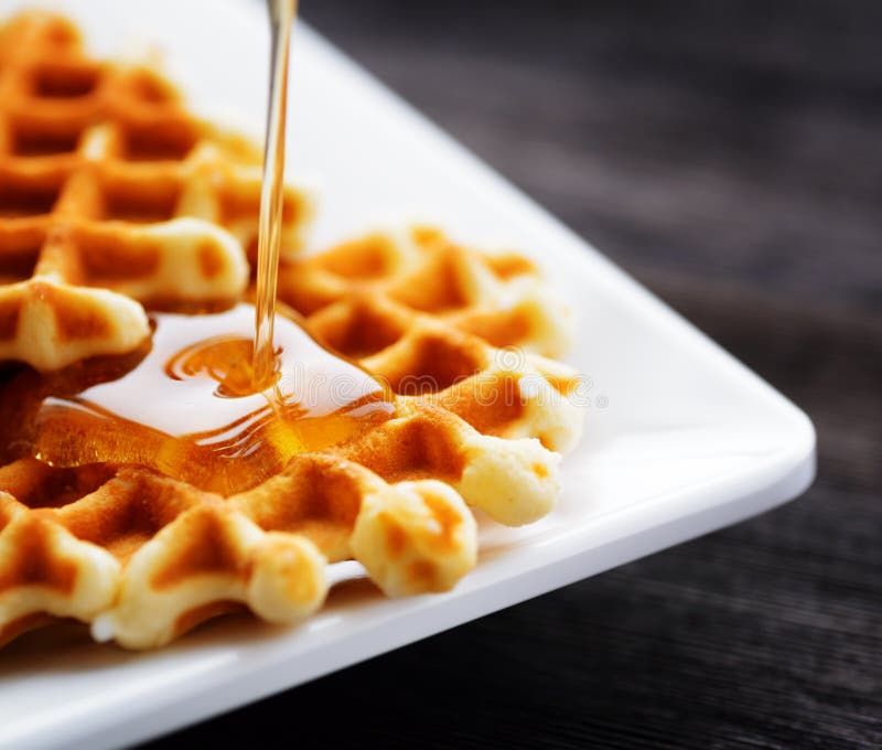 Caramel Sauce Flowing Over Waffles Stock Image - Image of raspberries ...