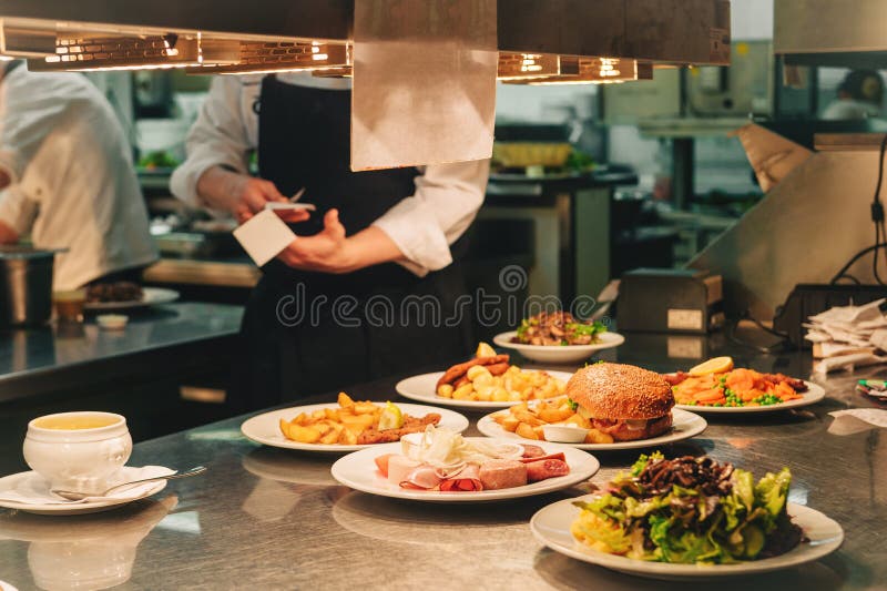Food Orders on the Kitchen Table Stock Photo - Image of garnish ...