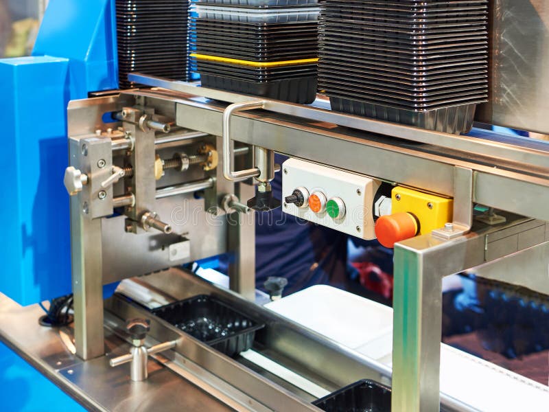 Food packaging equipment stock photo. Image of industry - 217174422