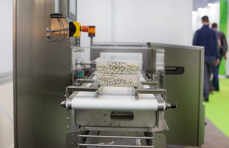 Food packaging machine stock image. Image of equipment - 148505109