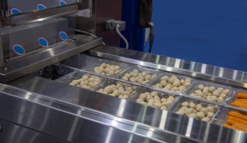 Food packing machine stock image. Image of package, product - 141363423