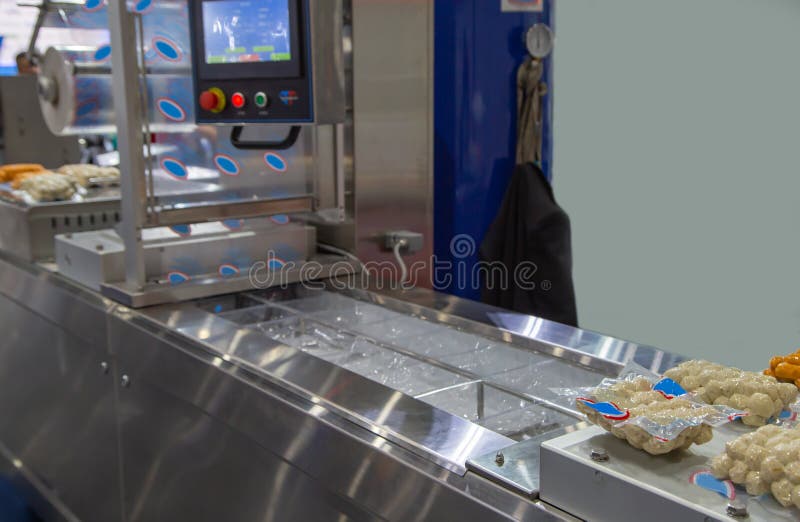 Food packing machine stock photo. Image of operate, production - 141363472