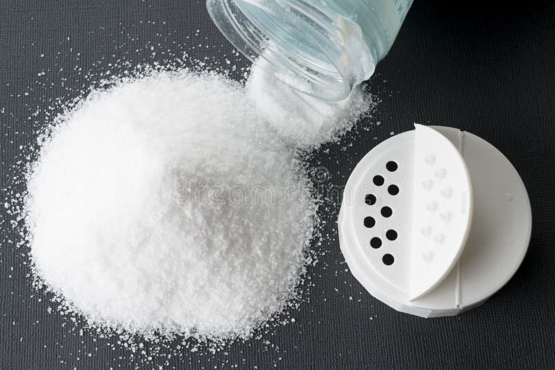 Food Salt and an Open Jar with a Lid, on the Table Stock Photo - Image ...