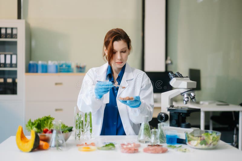Food Science As Lab Scientists Test and Analyze Vegetables for Safety ...