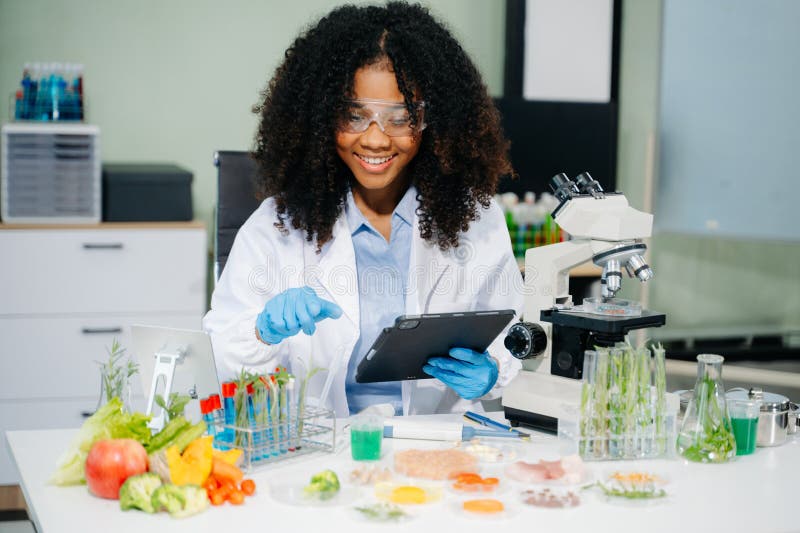 Food Science As Lab Scientists Test and Analyze Vegetables for Safety ...