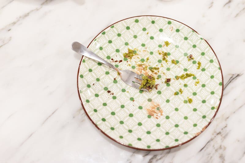 Food Scraps on Plates and Forks Stock Photo - Image of concrete ...