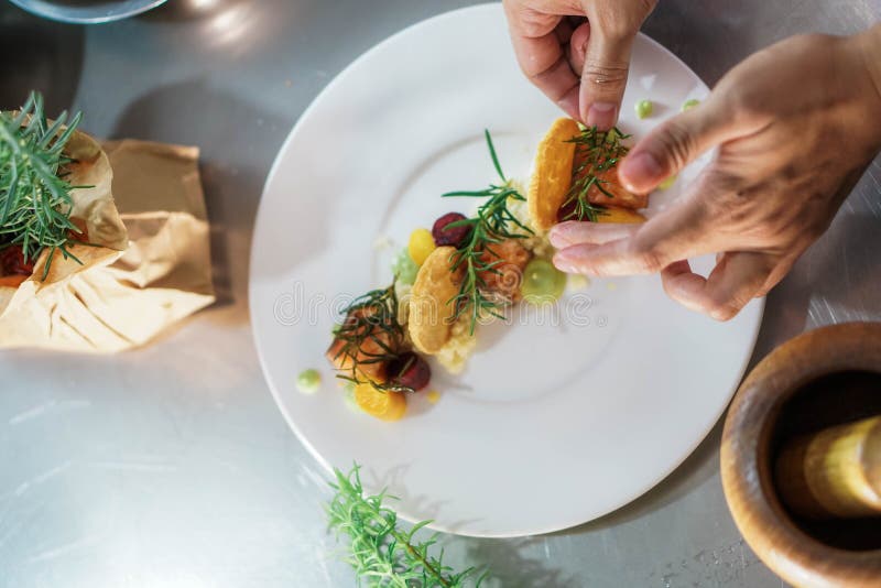 Food served on a dish stock image. Image of chef, kitchen - 144325283