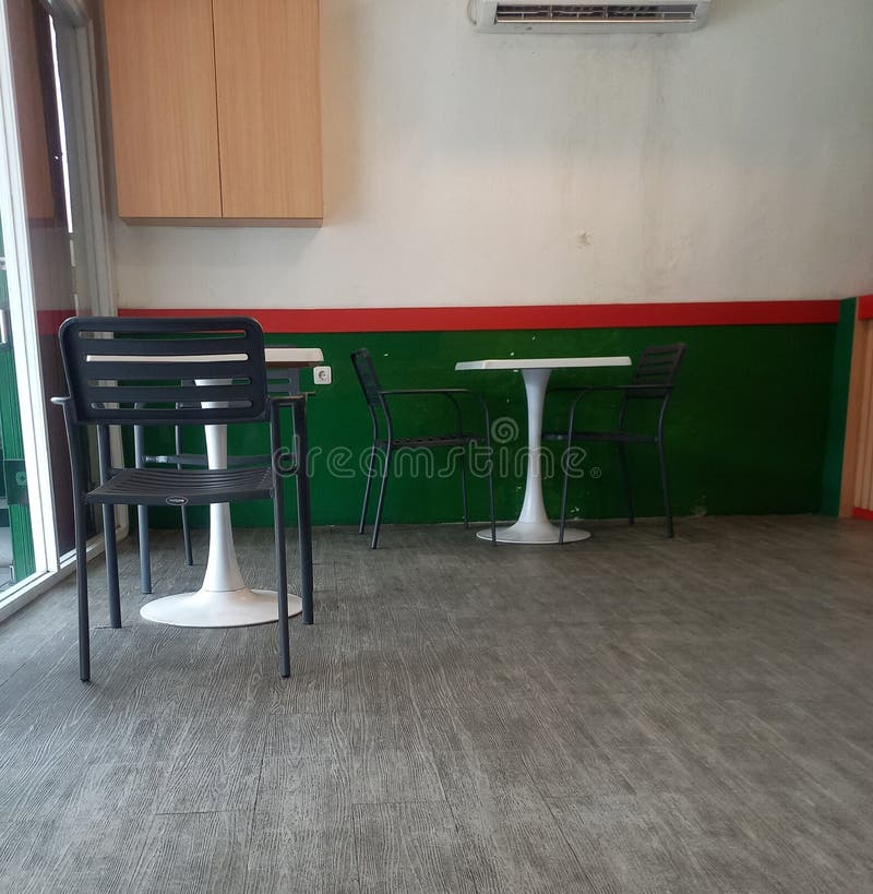 Food Stall with White Tables and Black Chairs Stock Photo - Image of ...